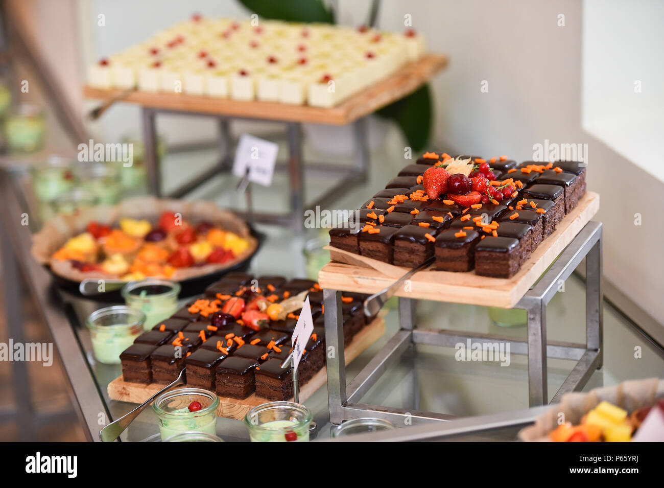 Catering service with delicious deserts and fruit tarts Stock Photo - Alamy