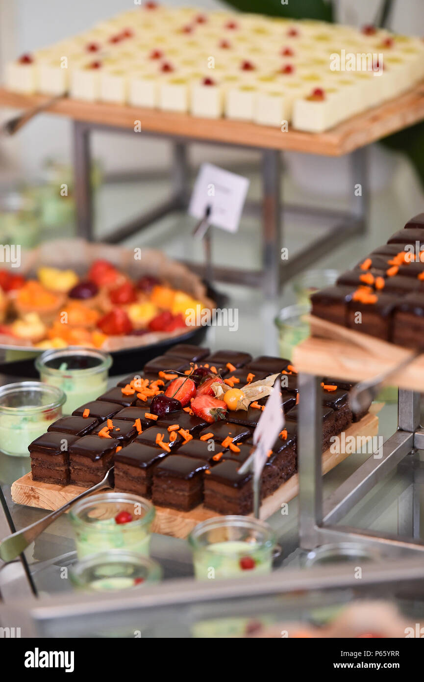 Catering service with delicious deserts and fruit tarts Stock Photo - Alamy