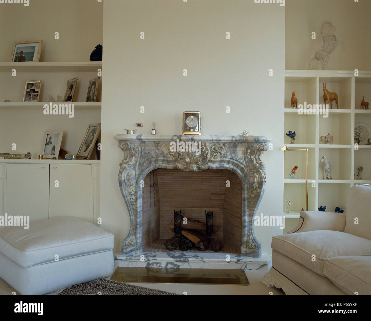 View of a fireplace in a living room Stock Photo - Alamy