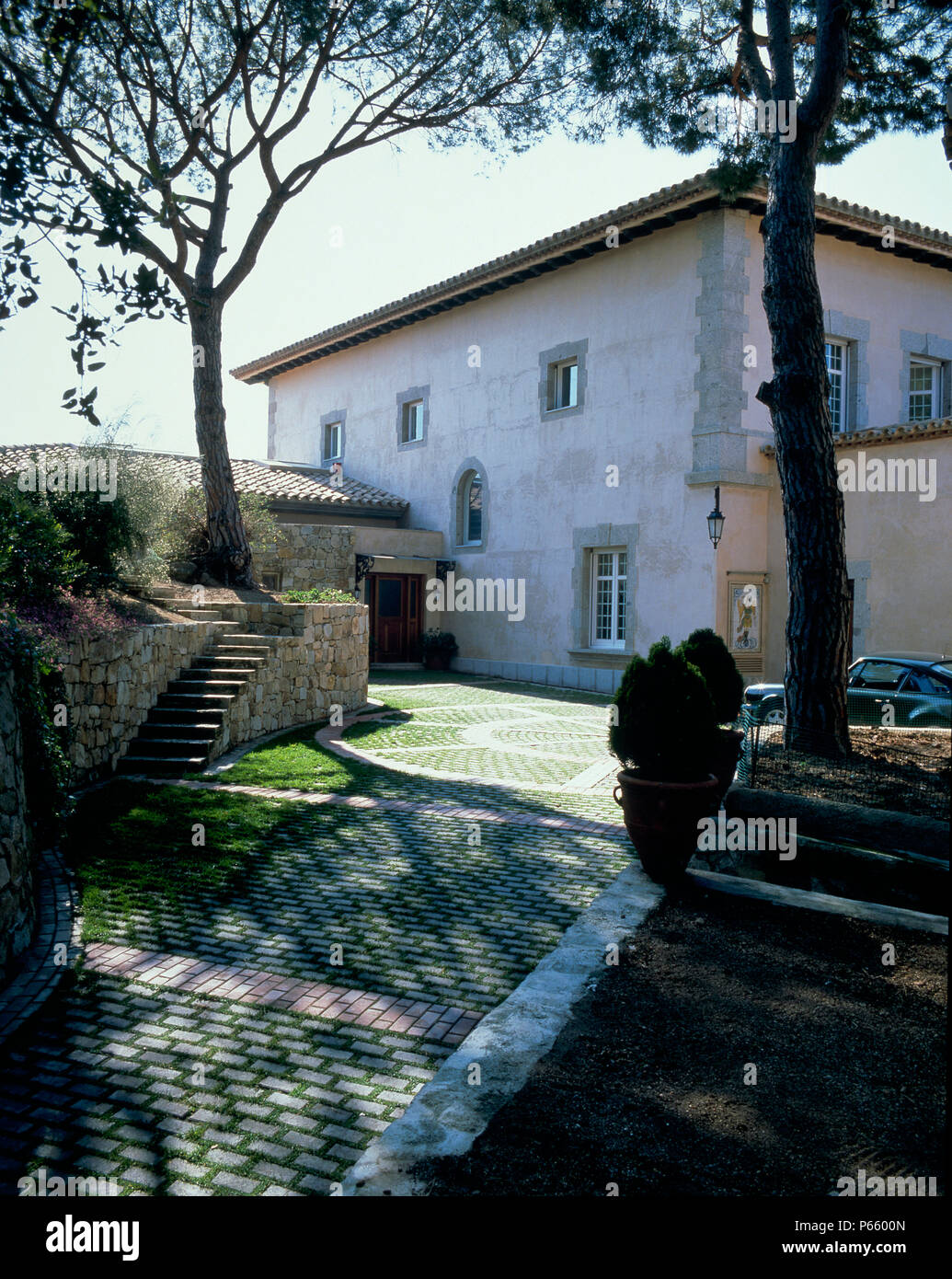 View of a house from a driveway Stock Photo - Alamy