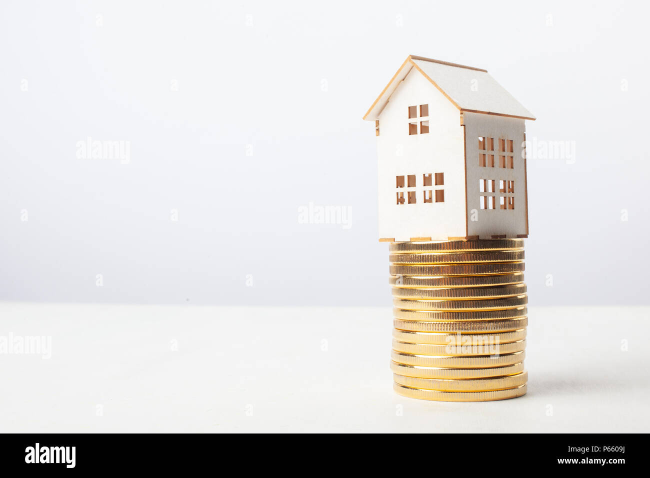 Coins stacks building hi-res stock photography and images - Alamy