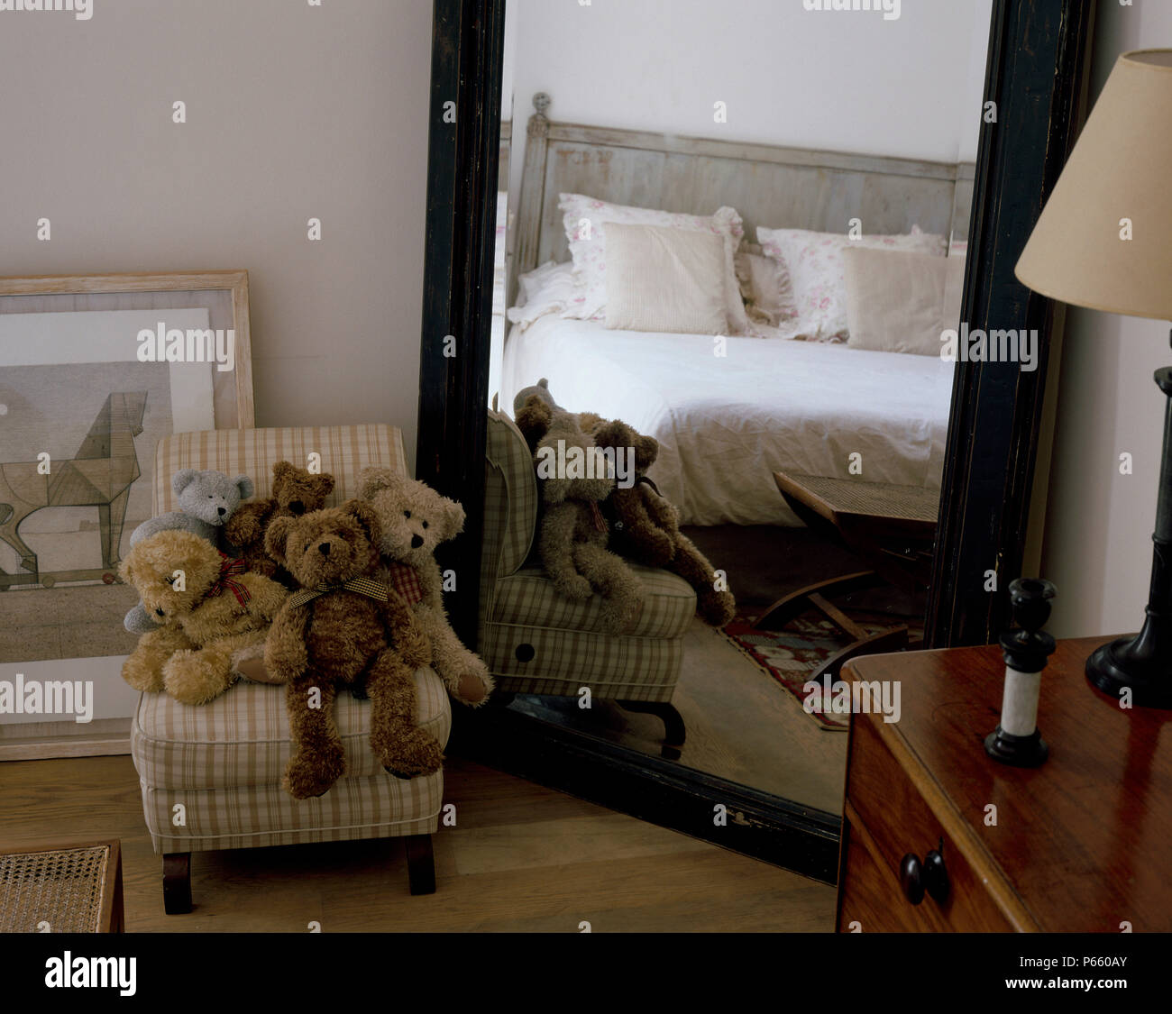 View of teddy bears on a chair Stock Photo - Alamy