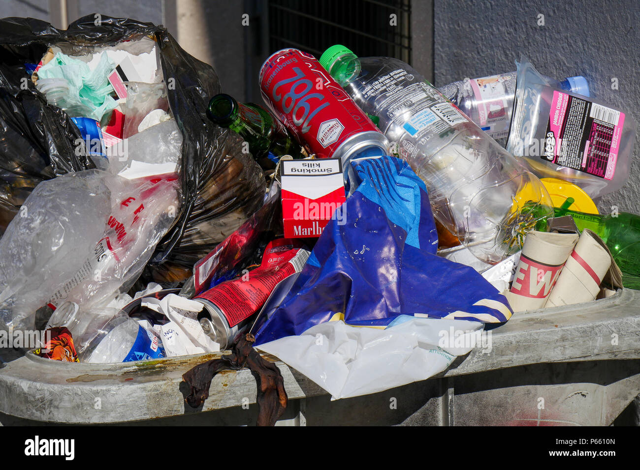 Garbage in a dustbin, Lyon, France Stock Photo - Alamy