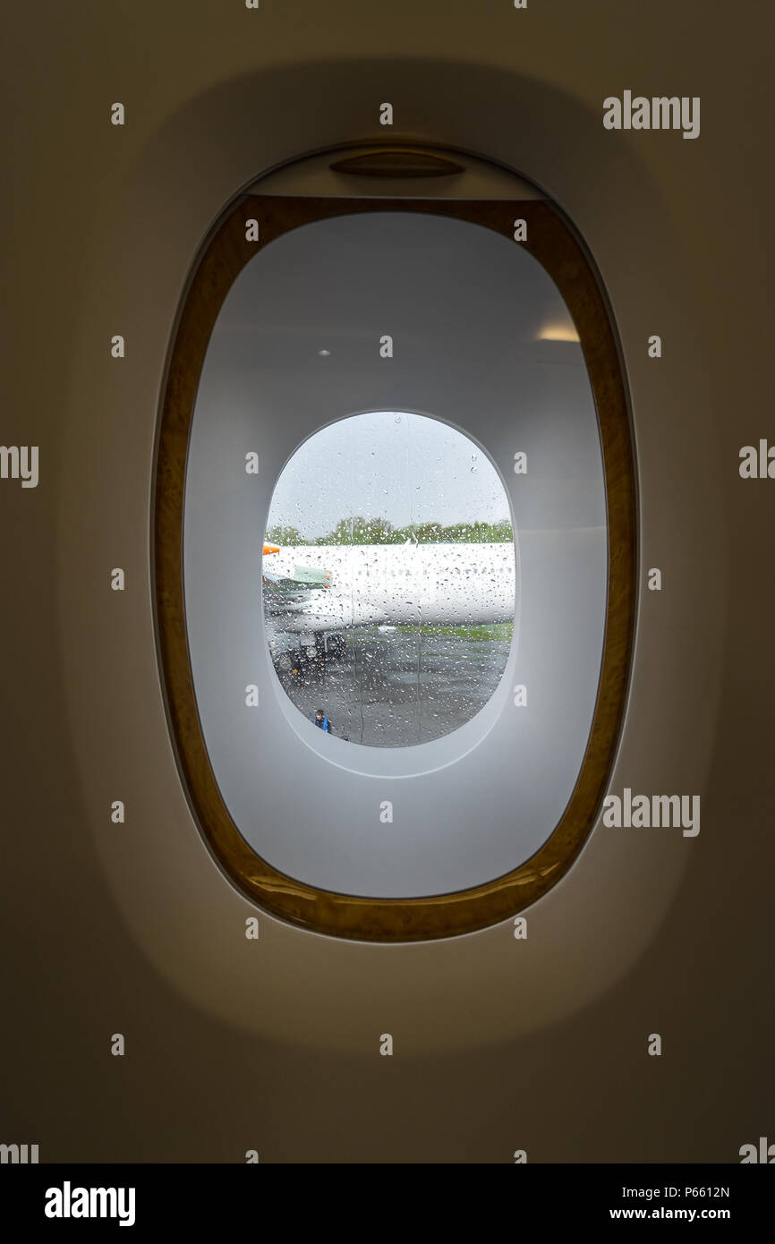 The window in the cabin of passenger aircraft Stock Photo - Alamy
