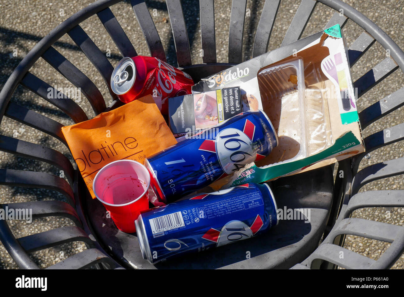 Garbage in a dustbin, Lyon, France Stock Photo - Alamy