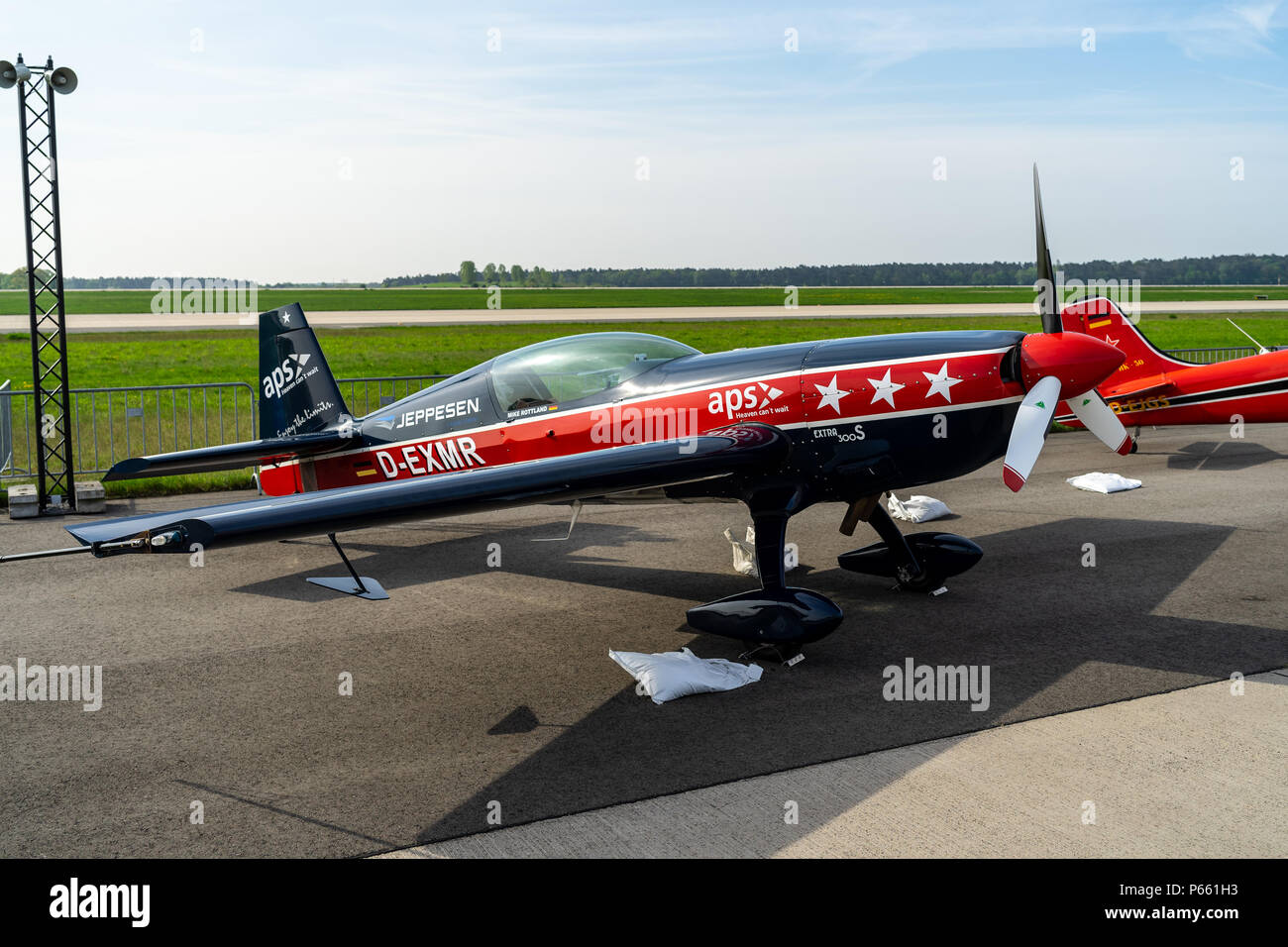 BERLIN - APRIL 27, 2018: Two-seat aerobatic monoplane Extra EA-300S ...