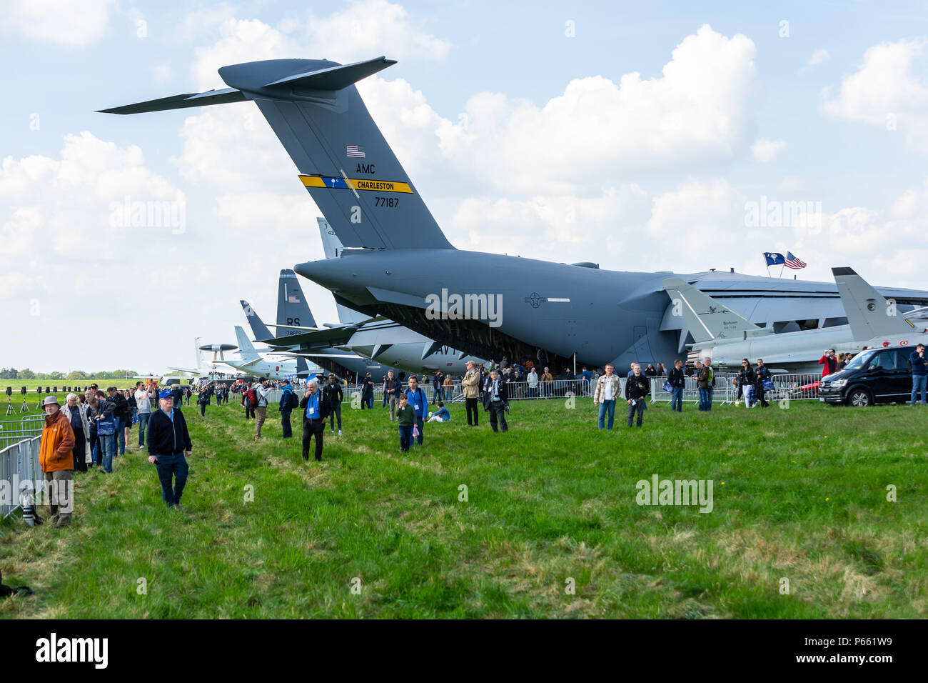 BERLIN - APRIL 27, 2018: Various aircraft and visitors on the airfield. Exhibition ILA Berlin ...