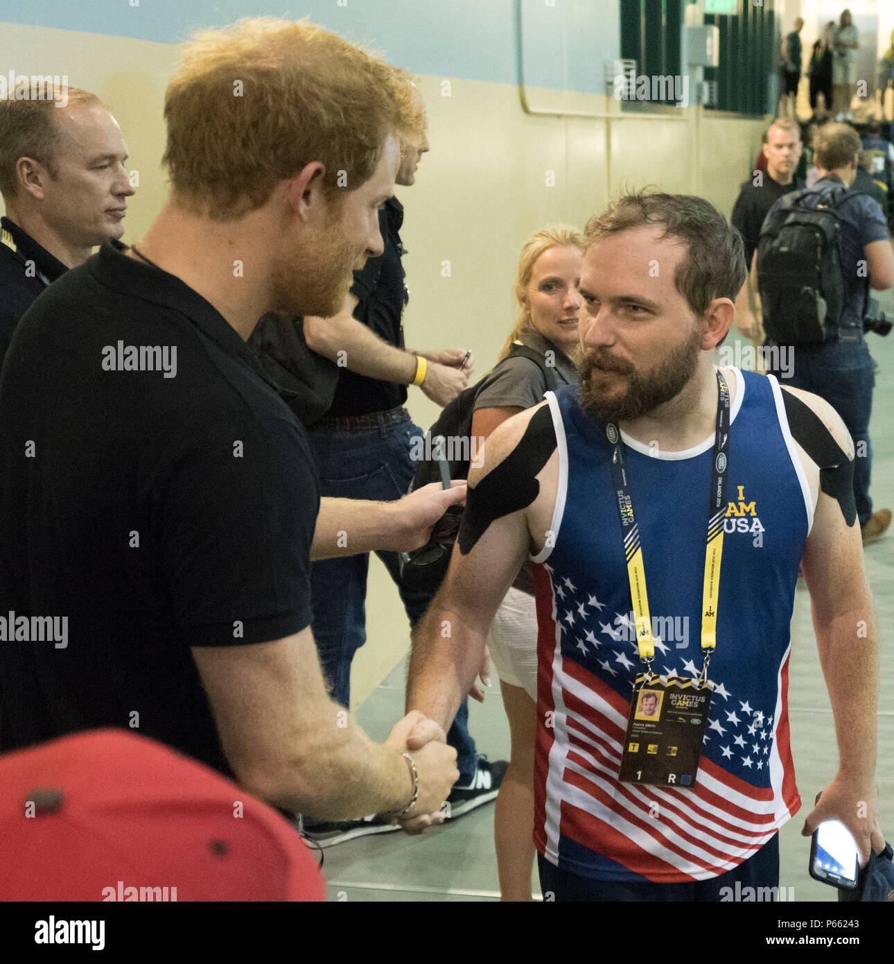 Prince Harry shakes hands with US Athlete USCOCOM SSg. Patrick Smith ...