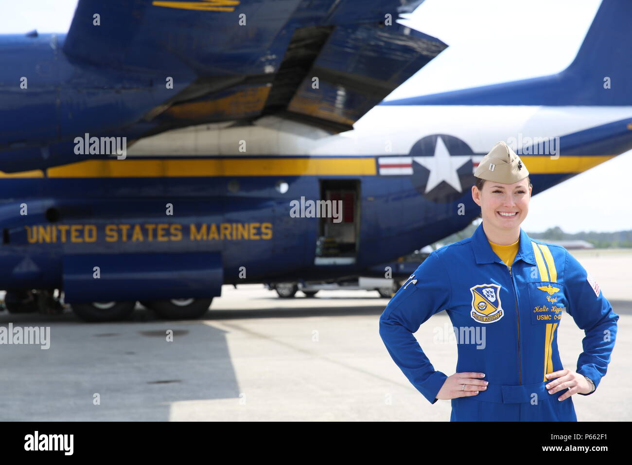 Capt. Katie Higgins poses in front of "Fat Albert", the U.S. Navy Blue ...