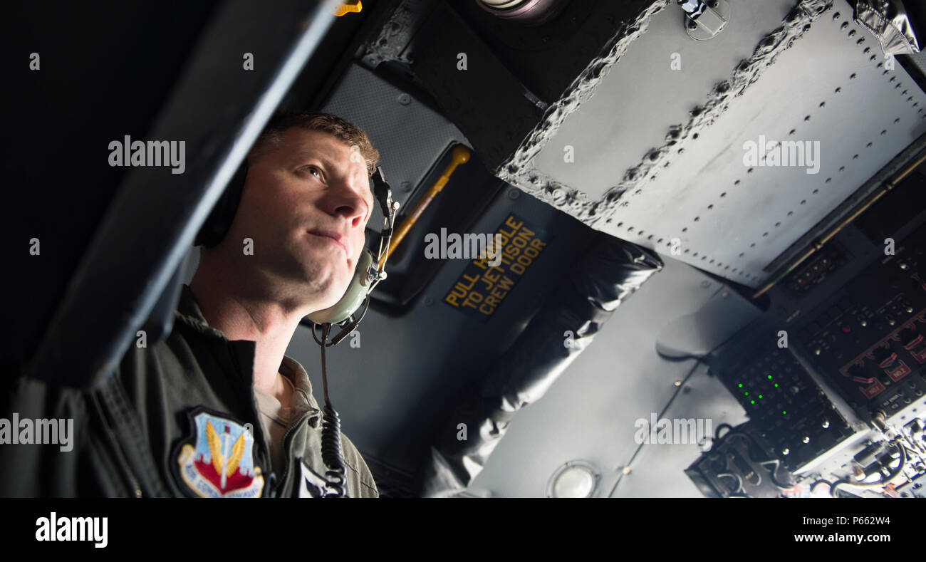 A U.S. Air Force AC-130U Spooky gunship reconnaissance systems officer ...