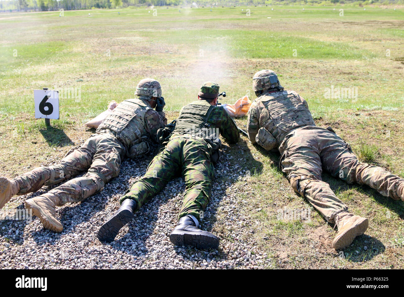 Ghost Troop, 2nd Squadron, 2nd Cavalry Regiment Soldiers watch as a ...