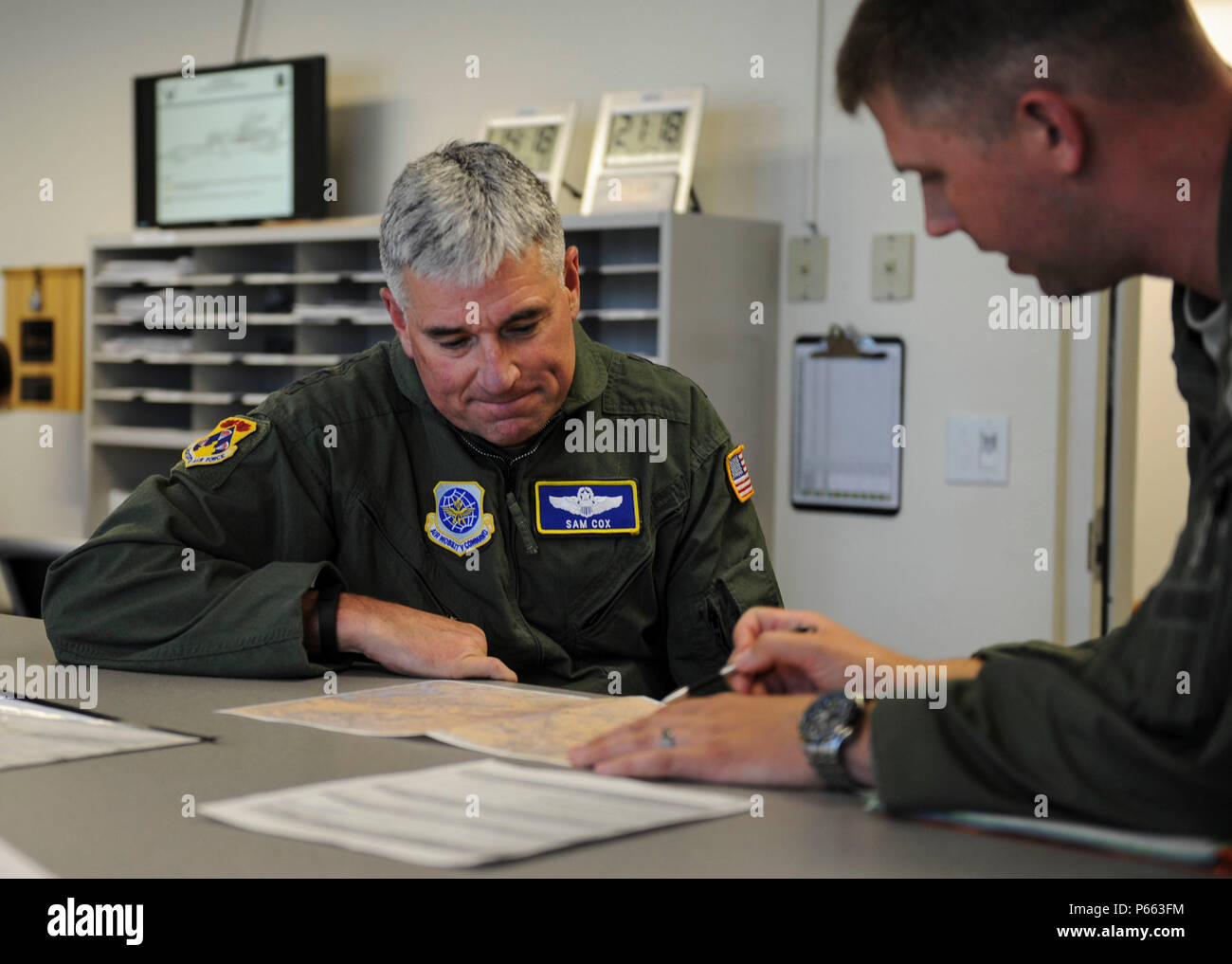 Lt. Gen. Sam Cox, 18th Air Force commander, participates in a mission ...