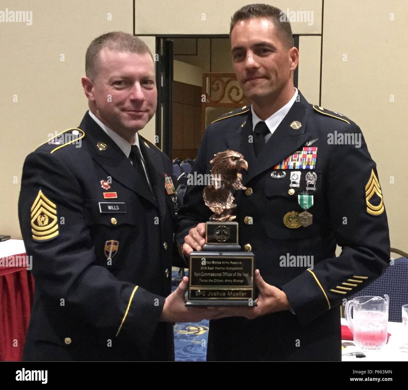 Sgt. 1st Class Joshua Moeller, right, representing the 108th Training ...