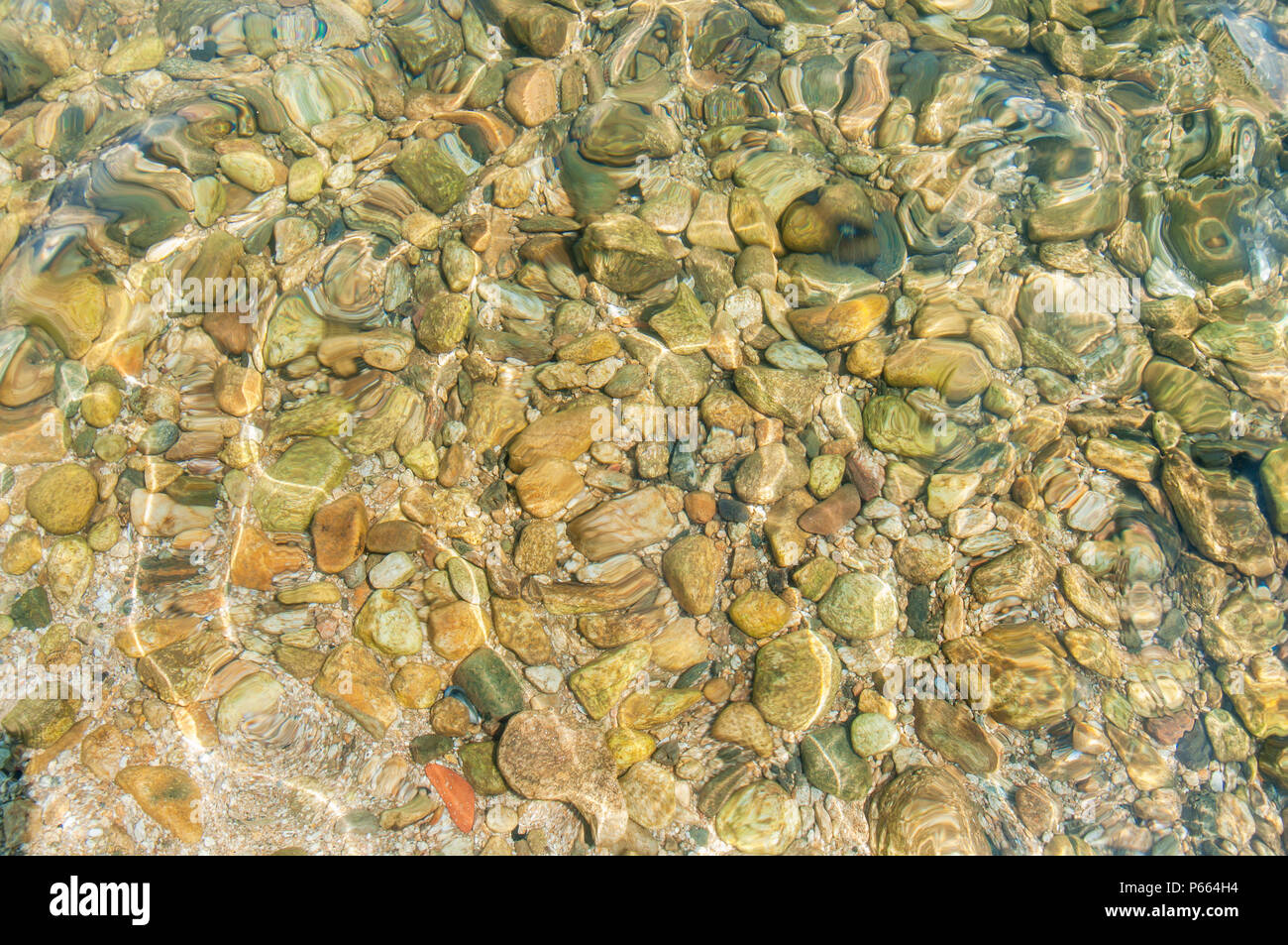 Wet grey pebble close hi-res stock photography and images - Alamy