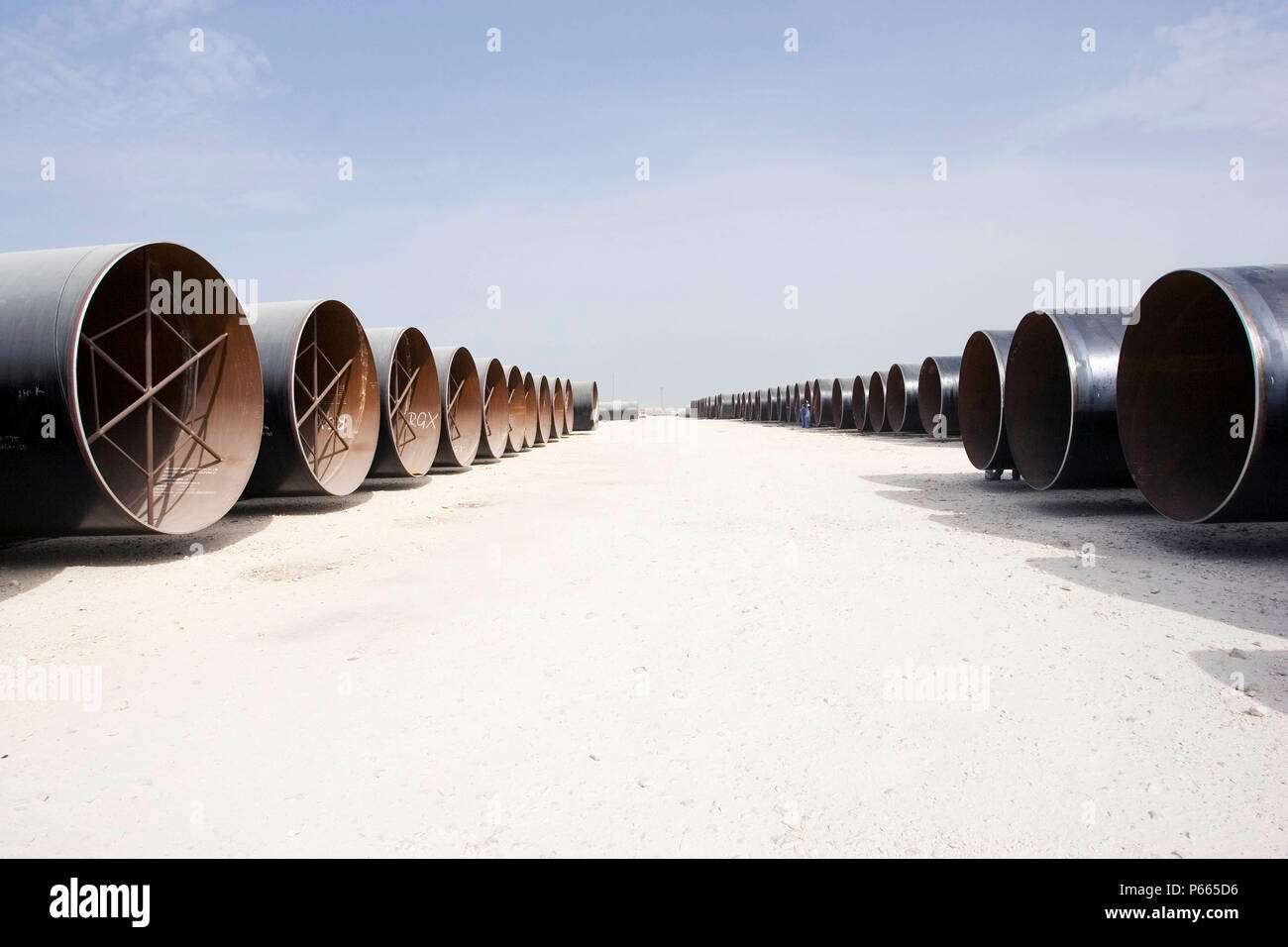 Workers at Hyojong Pipe factory, Doha Stock Photo - Alamy
