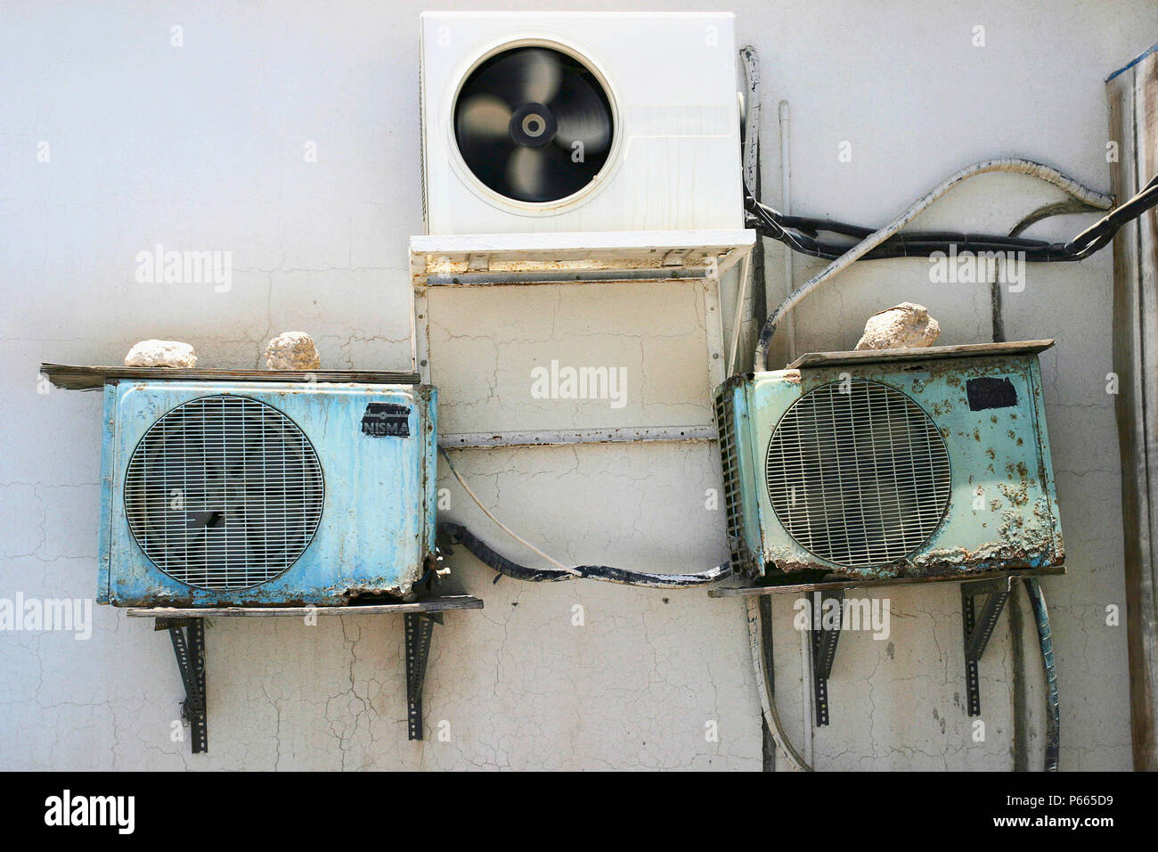 Air conditioning units on the side of a building Stock Photo - Alamy