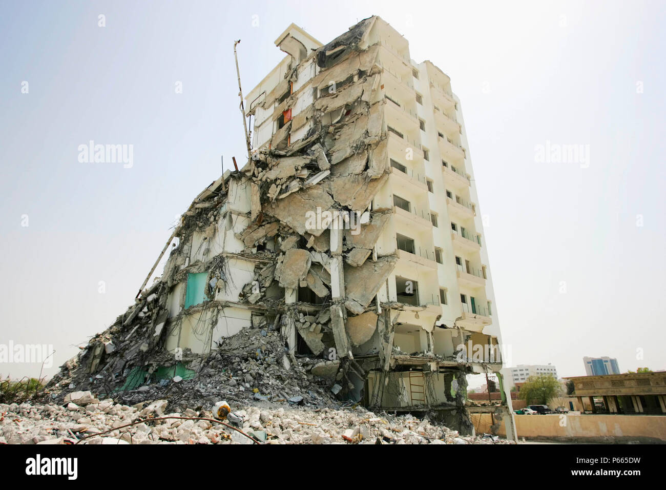 Demolition of a building in Qatar Stock Photo - Alamy
