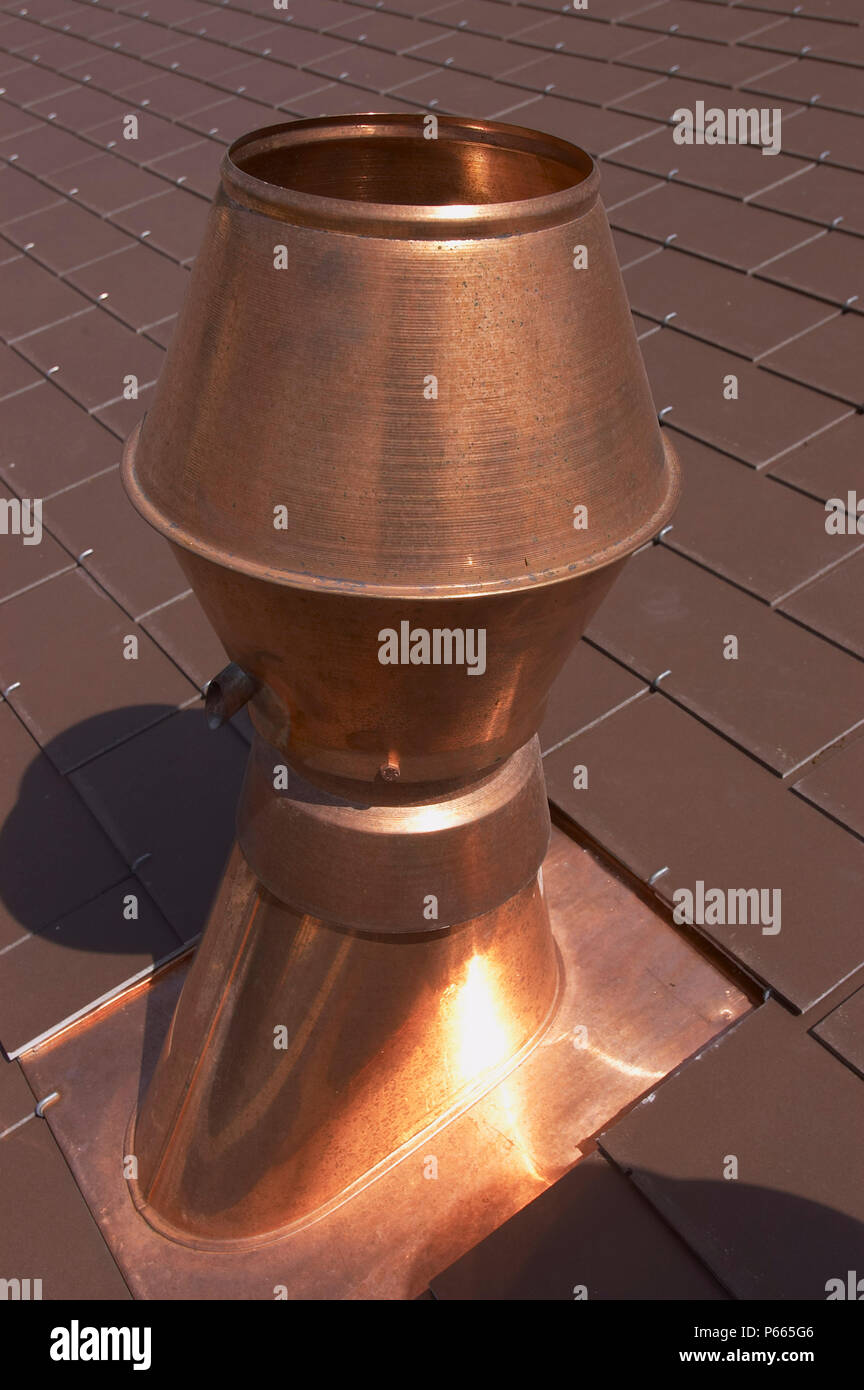 Copper chimney on roof Stock Photo - Alamy