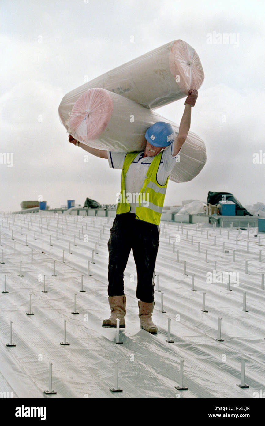 Carrying insulation on roof hi-res stock photography and images - Alamy
