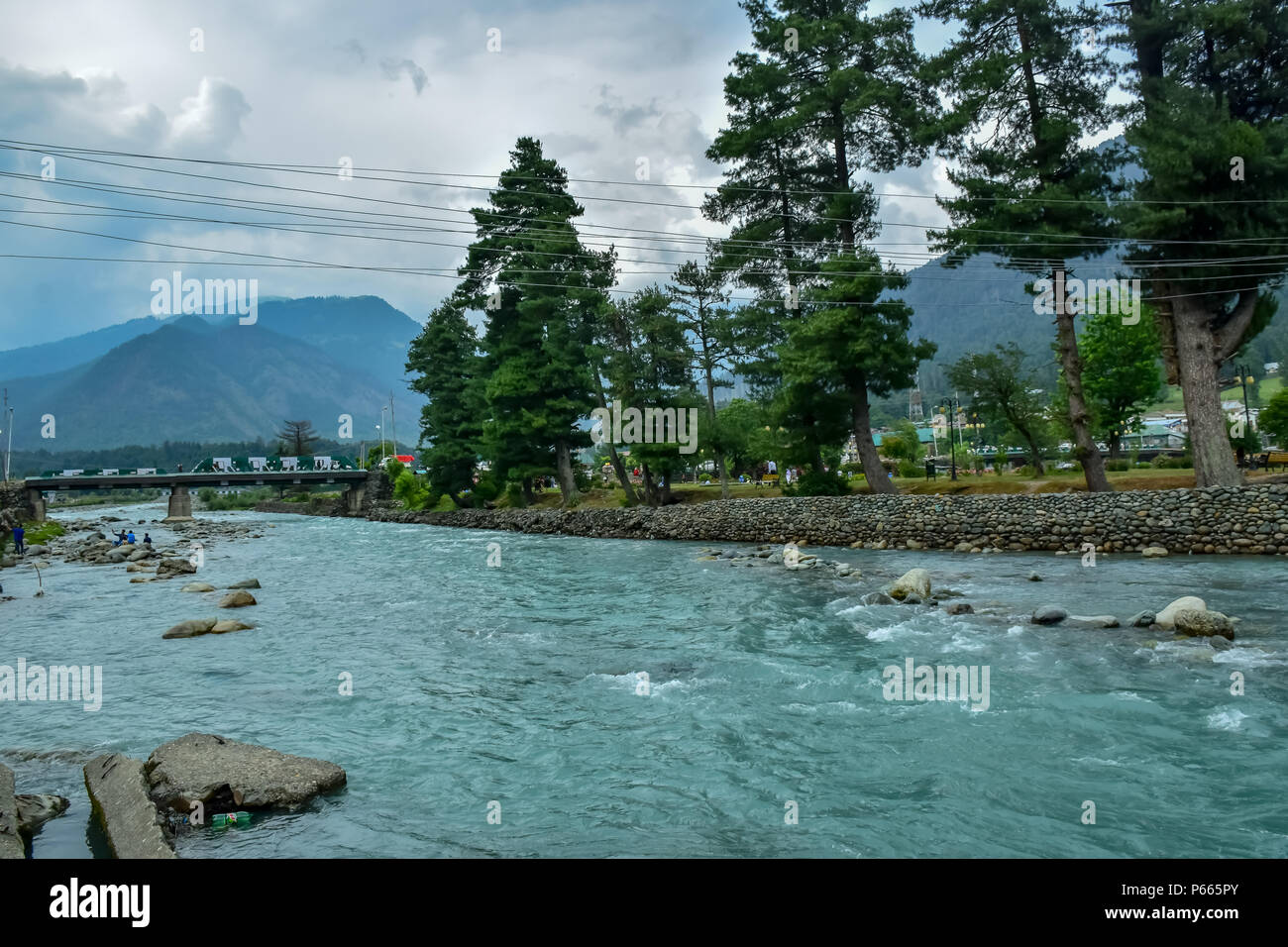 View of Pahalgam along with the river lidder flowing in the middle on a ...