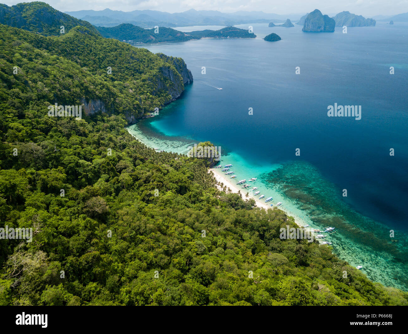 Aerial drone view of the scenic 7 Commando and Papaya beaches in El ...