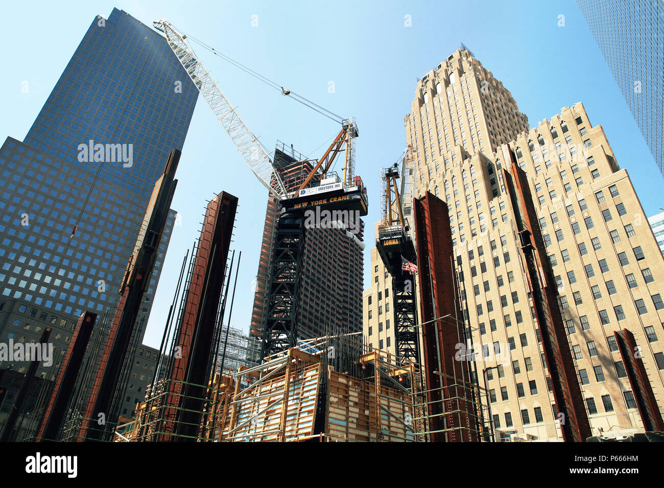 A worker secures 'g line' column at Tower One site, World Trade Center ...