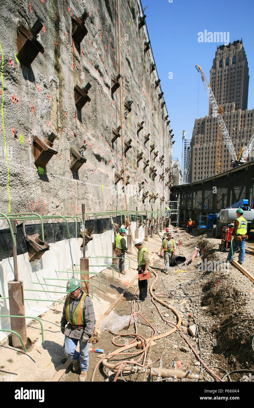 Workers at a part of slurry wall at the Memorial site, Lower Manhattan ...