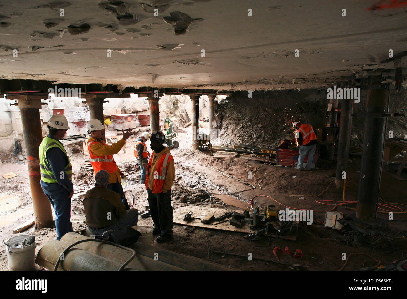 Workers under train track at Seacant Wall on World Trade Center site ...