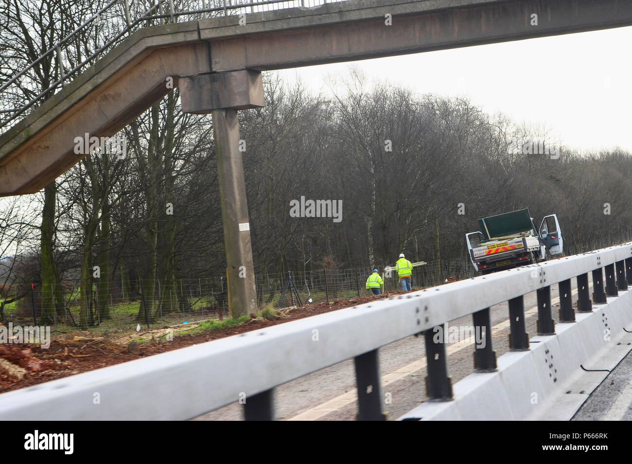 Roadworks under footbridge during M1 widening project between junctions ...