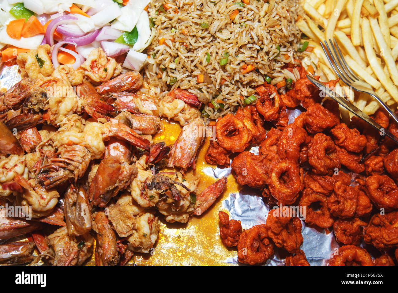 Seafood with traditional Indian spices. Varkala, Kerala Stock Photo - Alamy