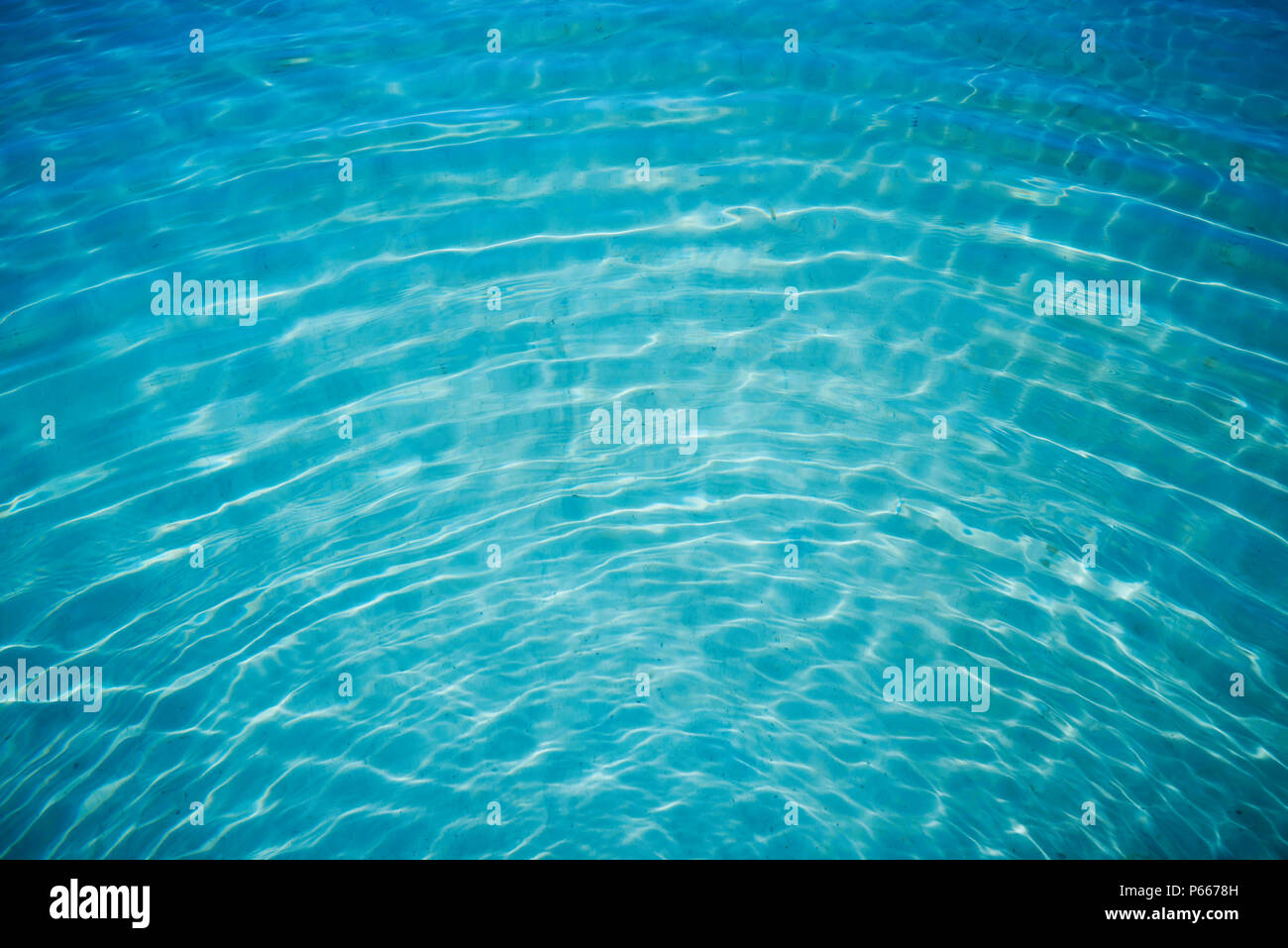 Background texture of blue water with sunlight reflections Stock Photo ...