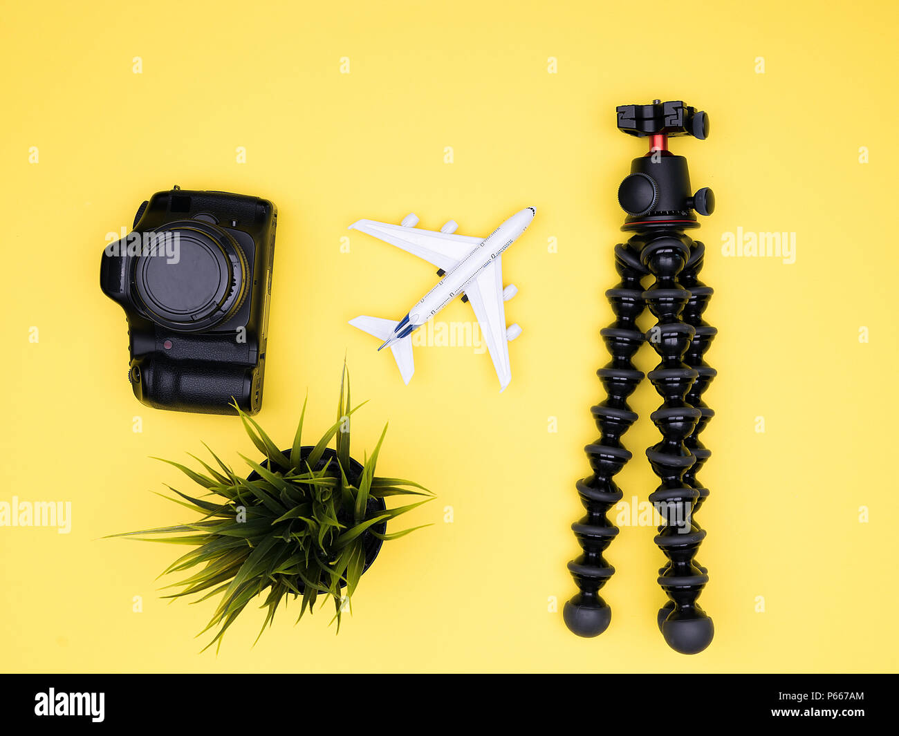 flat lay of traveler kit on yellow background Stock Photo - Alamy