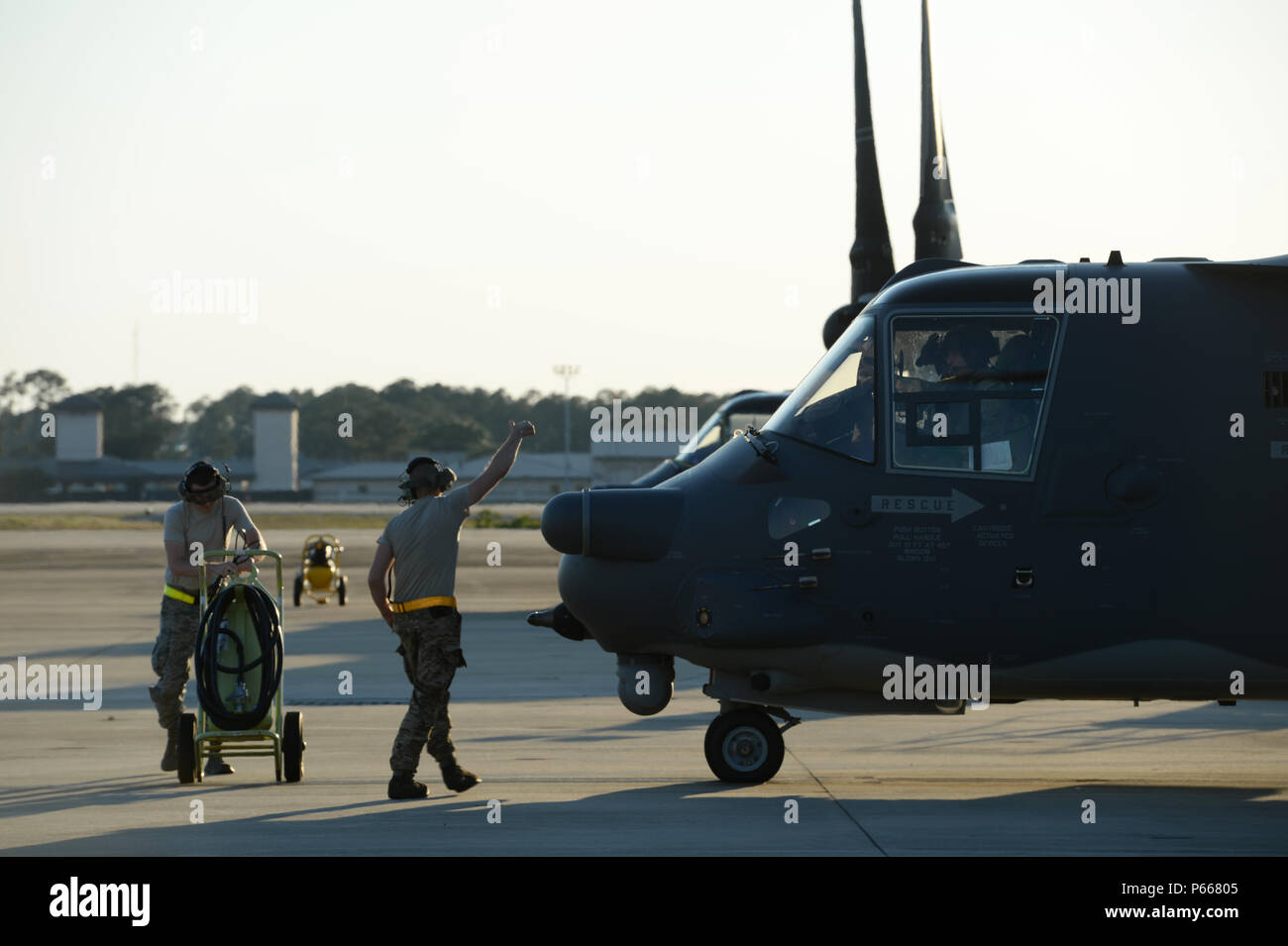 U.S. Air Force Senior Airman Kyle Greig and Staff Sgt. George Haas ...