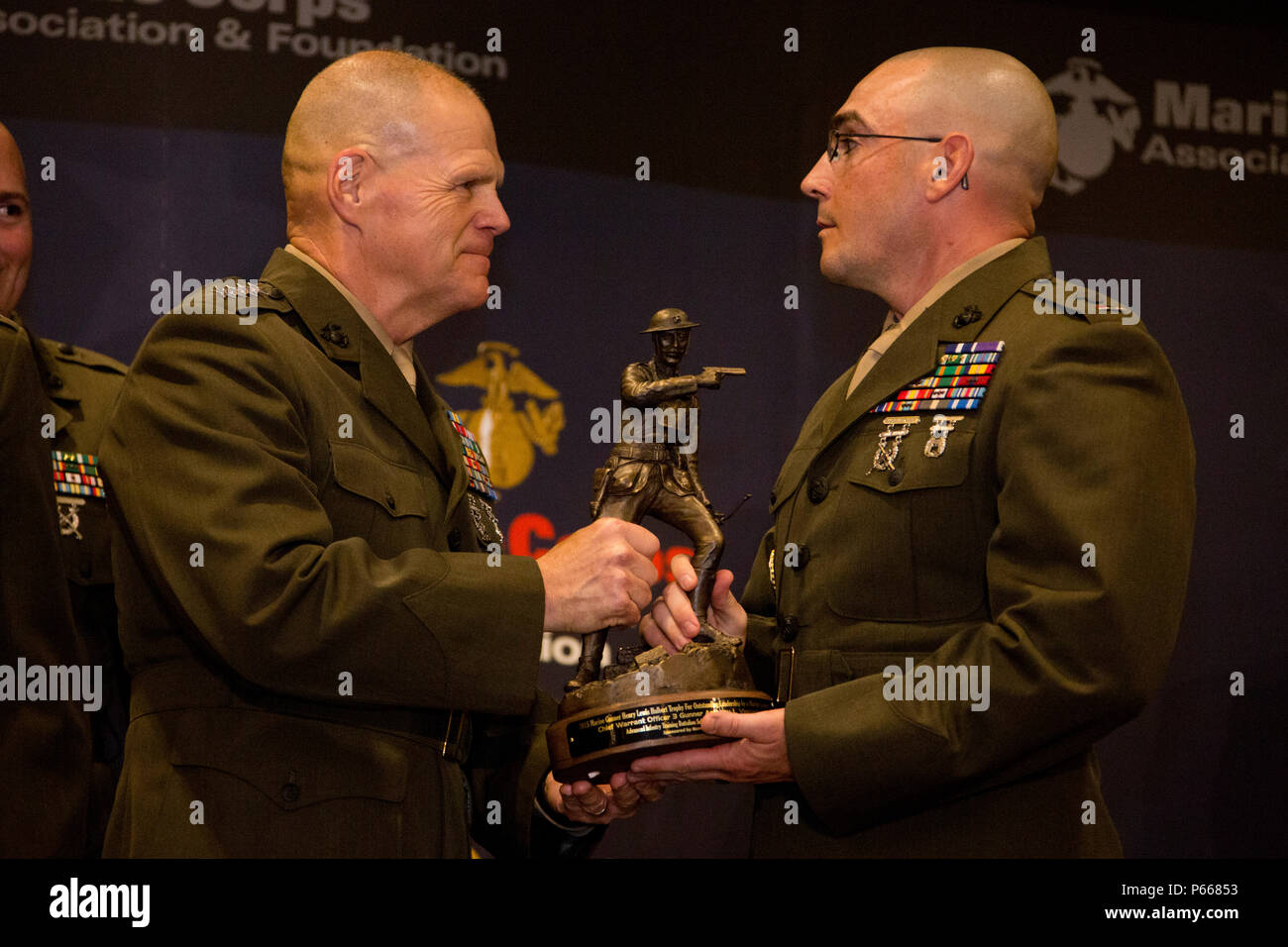 Commandant of the Marine Corps Gen. Robert B. Neller congratulates ...