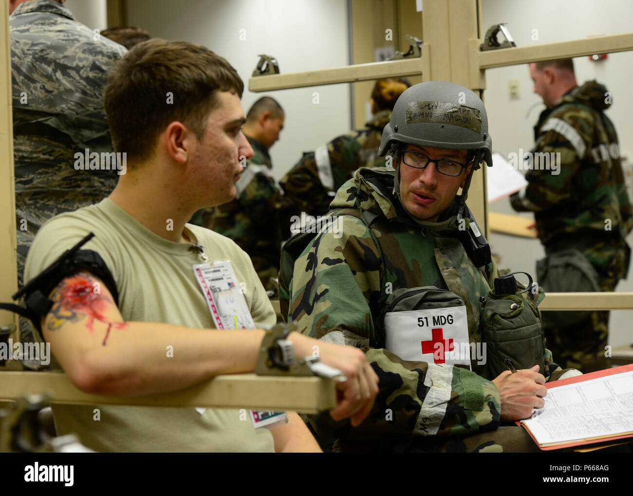 Capt. Samuel Madson, right, 51st Medical Group Delayed Team chief ...
