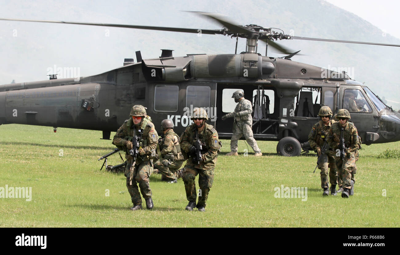 German soldiers operating under multinational hi-res stock photography ...
