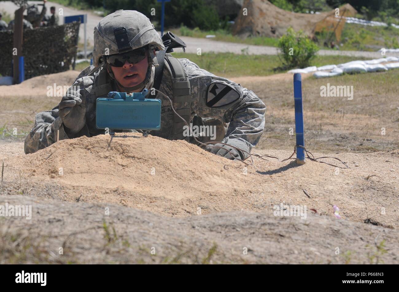 1st Lt. Skyler Reynolds, an infantry officer assigned to 215th Brigade ...