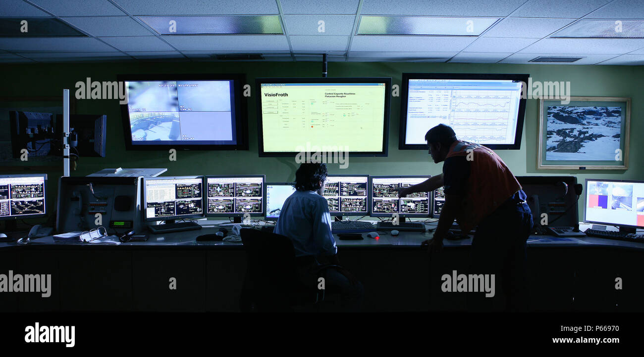 Two Man in Control Room in Escondida, Chile Stock Photo - Alamy