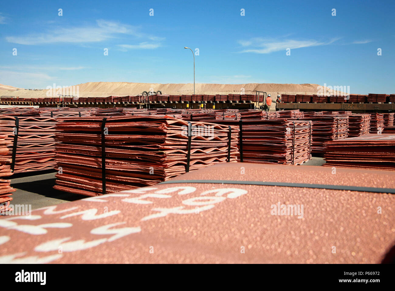 Two Men Checking The Train with Copper Cathodes For Dispatch in ...