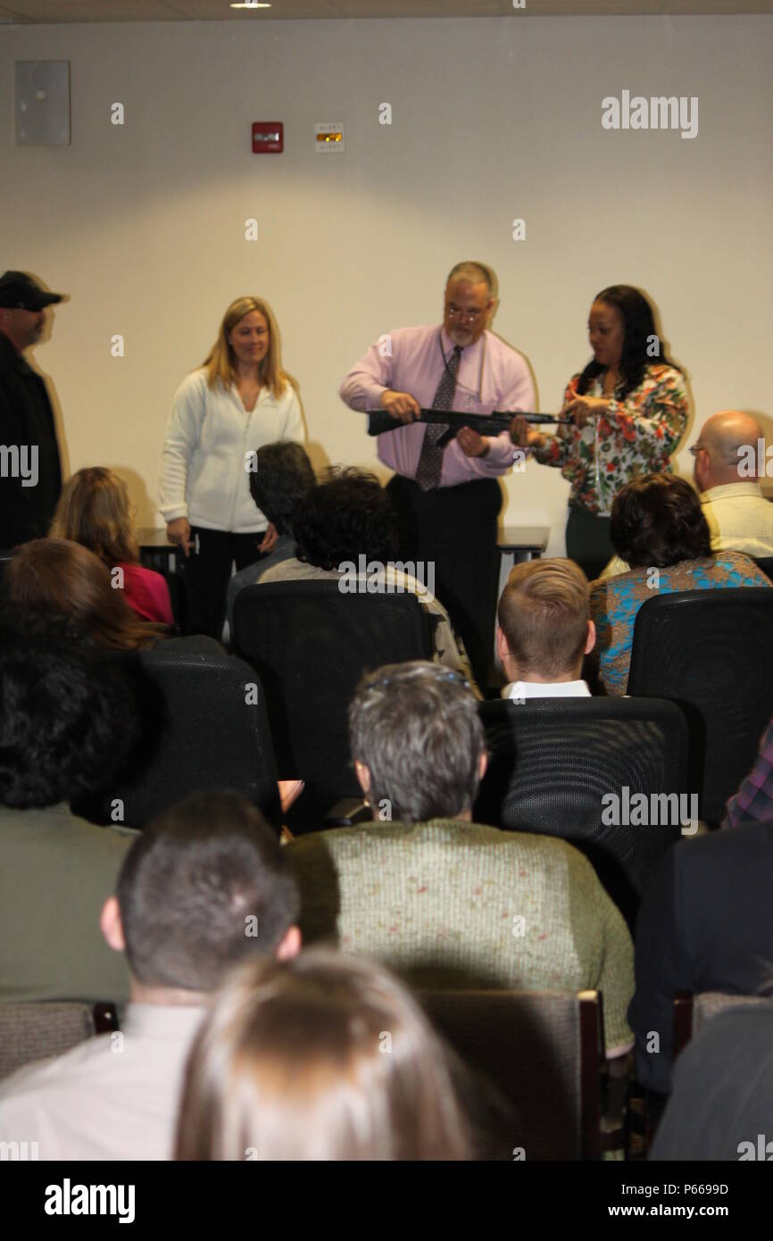 Emily O’Hara, Anthony Carlisi and Gerrie McClarine assemble the paper ...