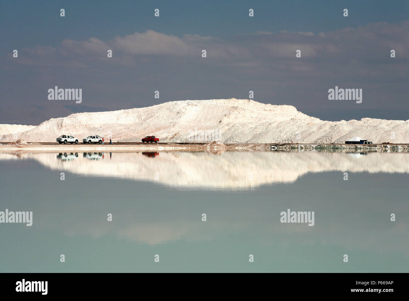 Workers inspecting the brine pools in the Salar de Atacama, Chile Stock ...