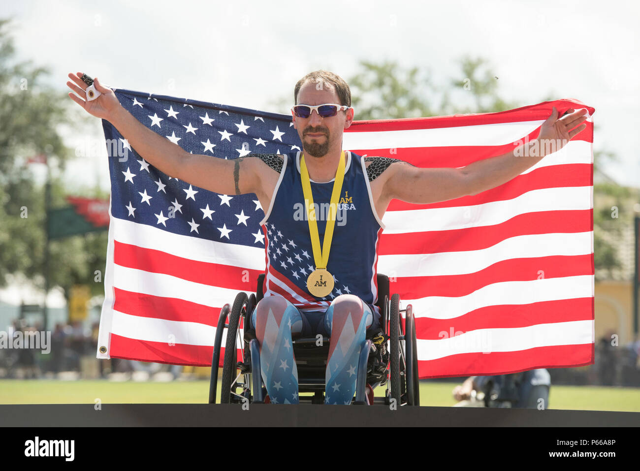 U.S. Navy veteran Steven Simmons celebrates his gold medal in the men's ...