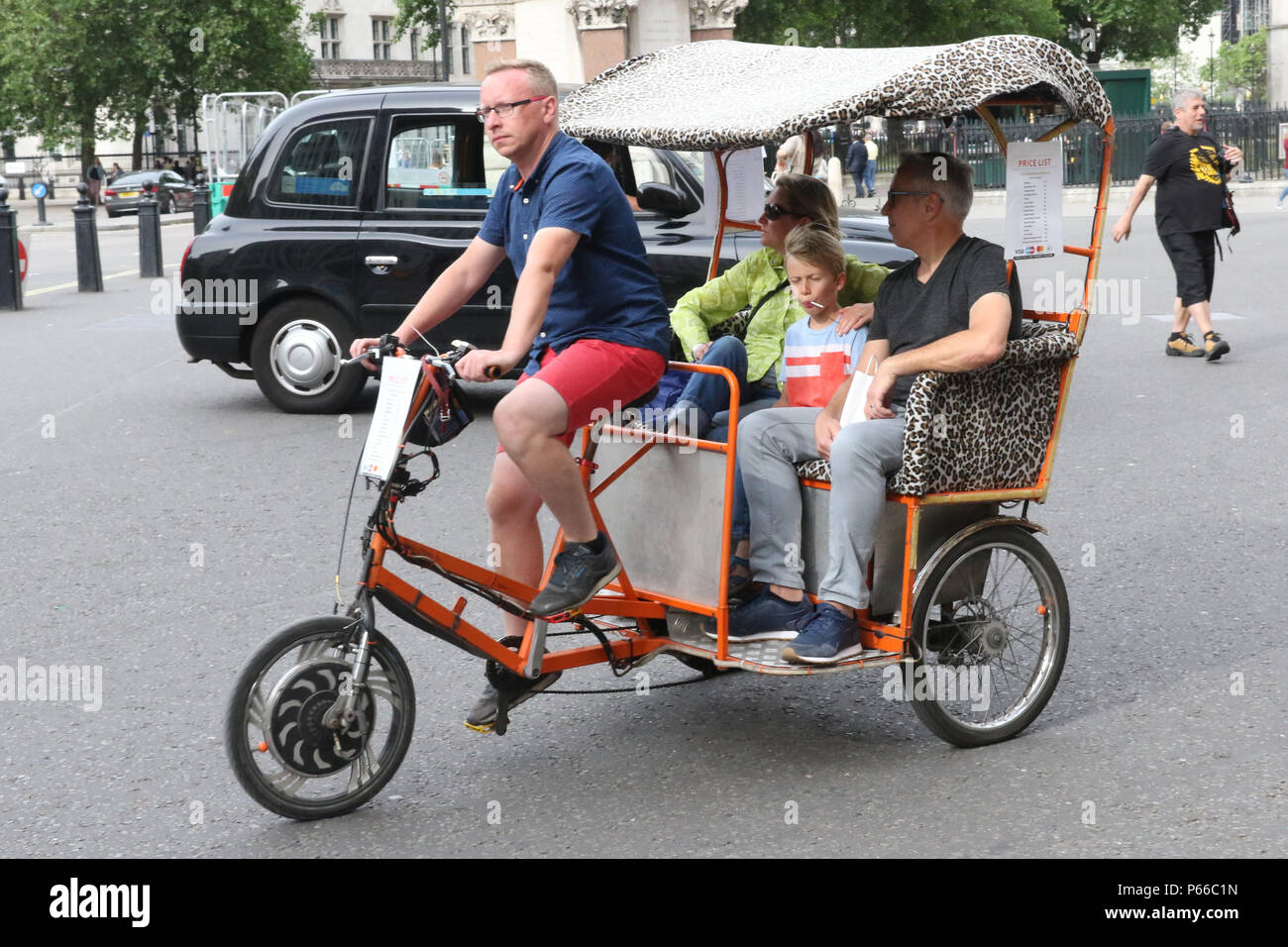 A bicycle rickshaw in London Stock Photo - Alamy