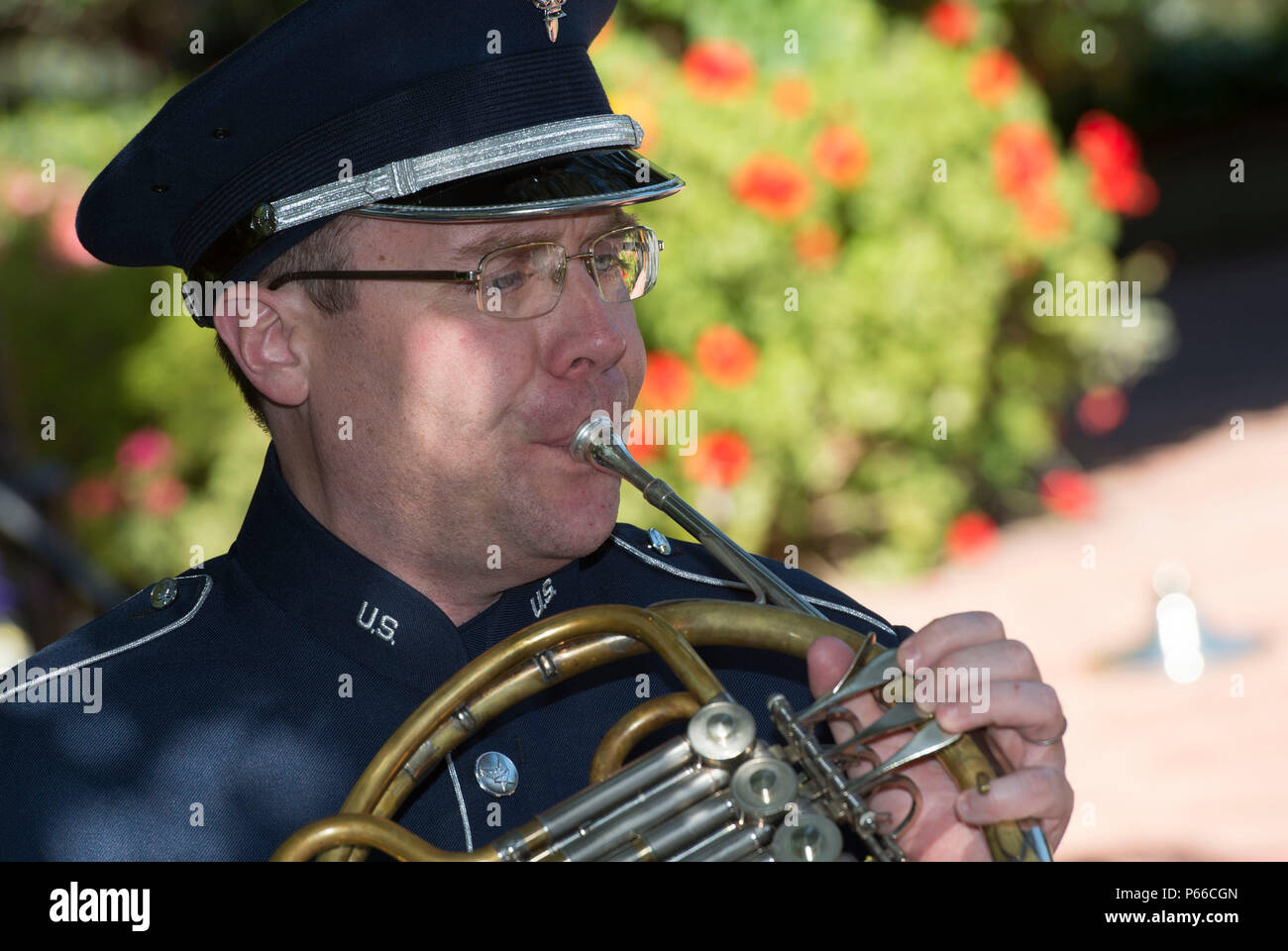 An Air Force musician plays music during an awards ceremony in honor of ...