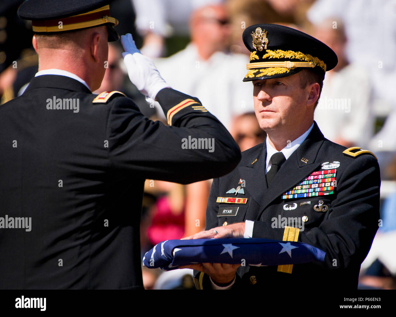 Brig. Gen. Kurt Ryan, commandant of the Army Ordnance School, accepts a ...