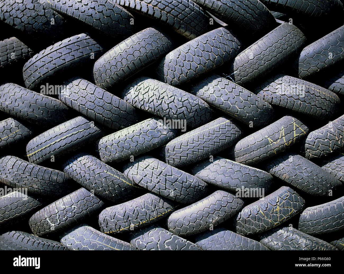 Used tyres at collecting point Stock Photo - Alamy