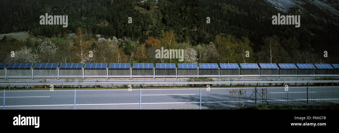 Solar panels beside highway - Switzerland Stock Photo - Alamy