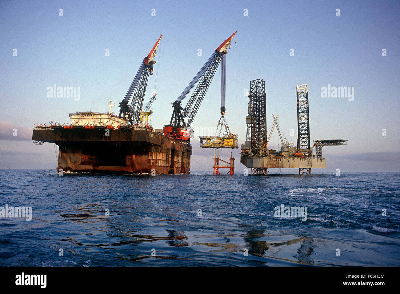Installing gas production platform with crane barge. Southern North Sea ...