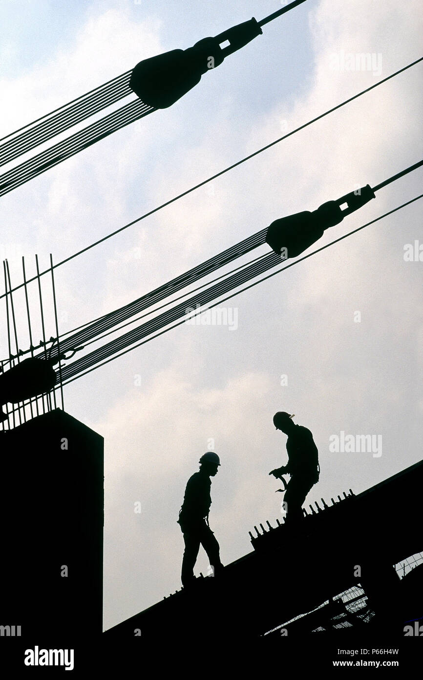 Spinning cables. Tsing Ma suspension bridge. China. Constructed to link ...