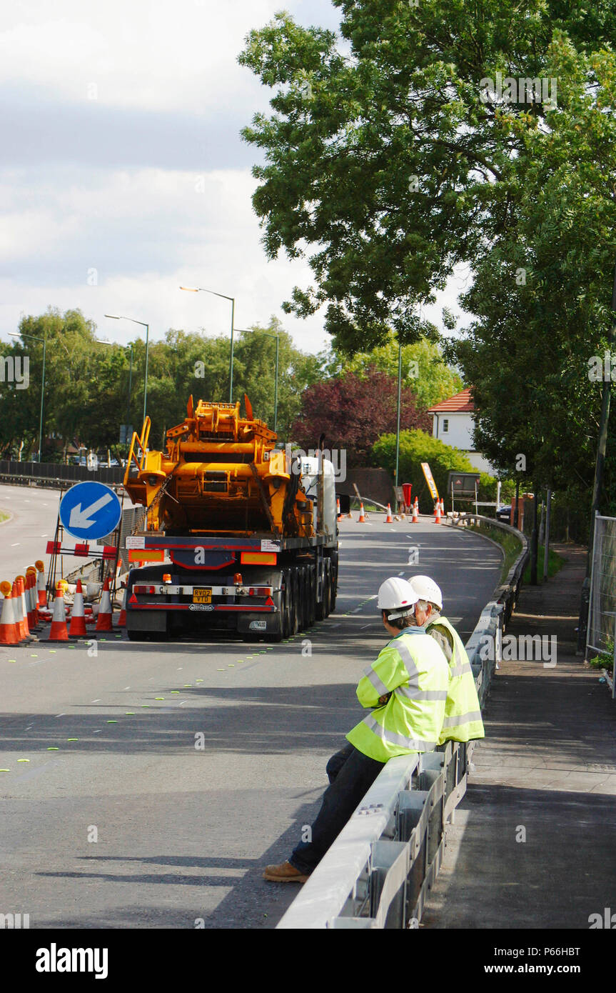 Mobile crane blocking access to road, Manchester, UK Stock Photo - Alamy